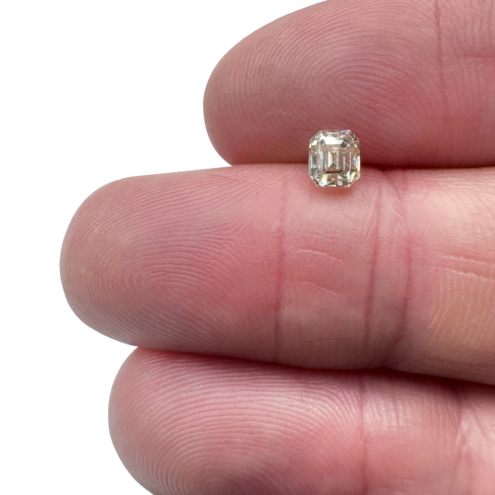 0.71ct | Champagne SI Emerald Shape Step Cut Diamond – Alexis Russell